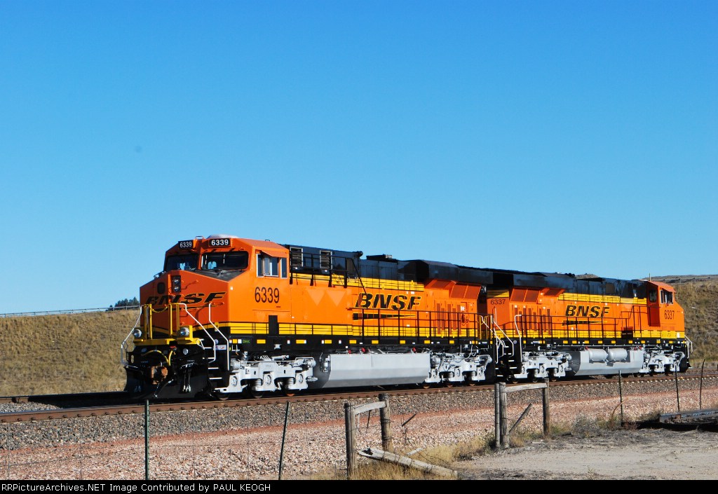 Long distance shot of two Brand new ES44AC'S BNSF 6339 and BNSF 6337.